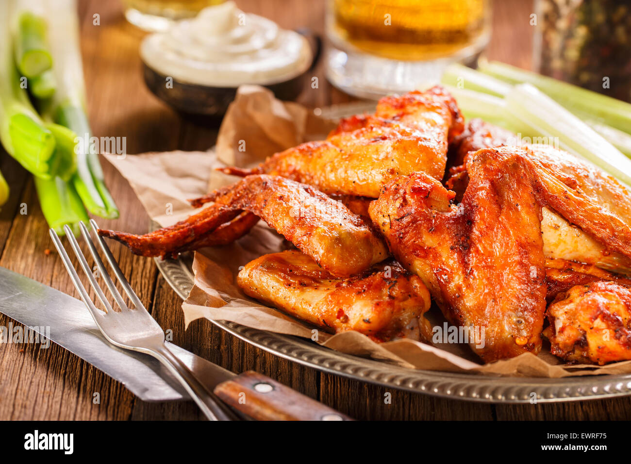 Roasted wings with sauce Stock Photo - Alamy