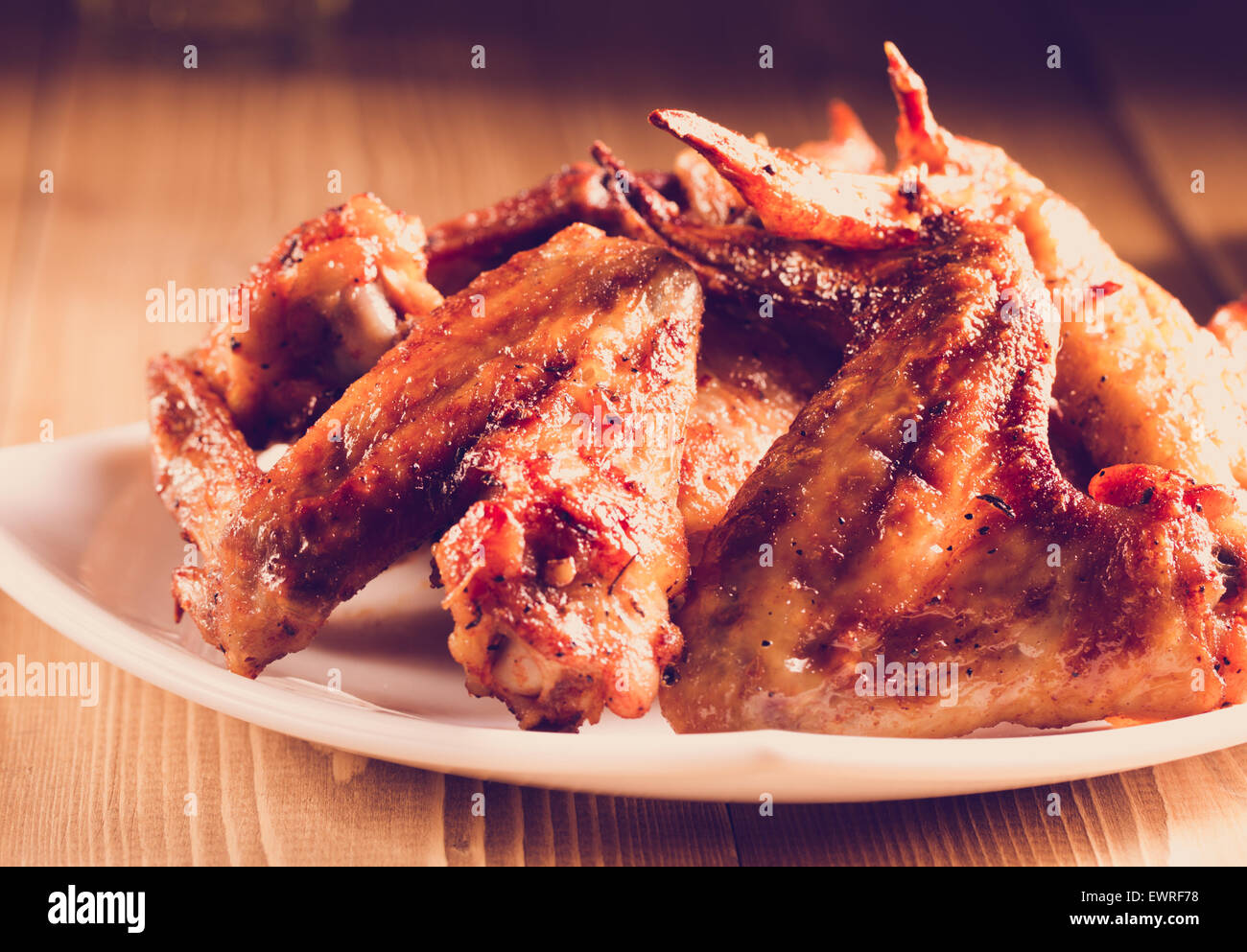 Roasted wings with sauce Stock Photo - Alamy