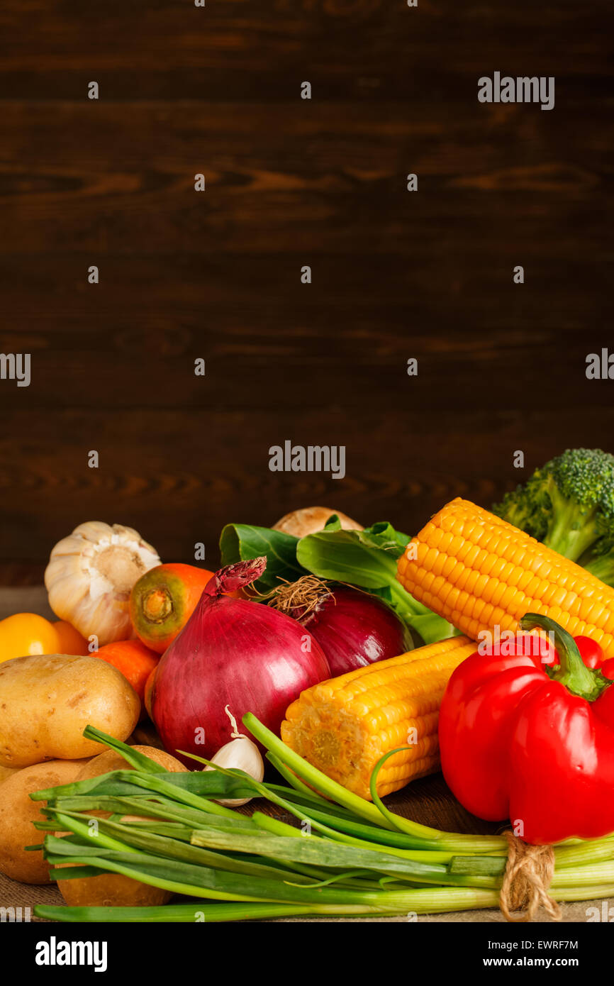 Bunch of vegetables on wooden background Stock Photo - Alamy