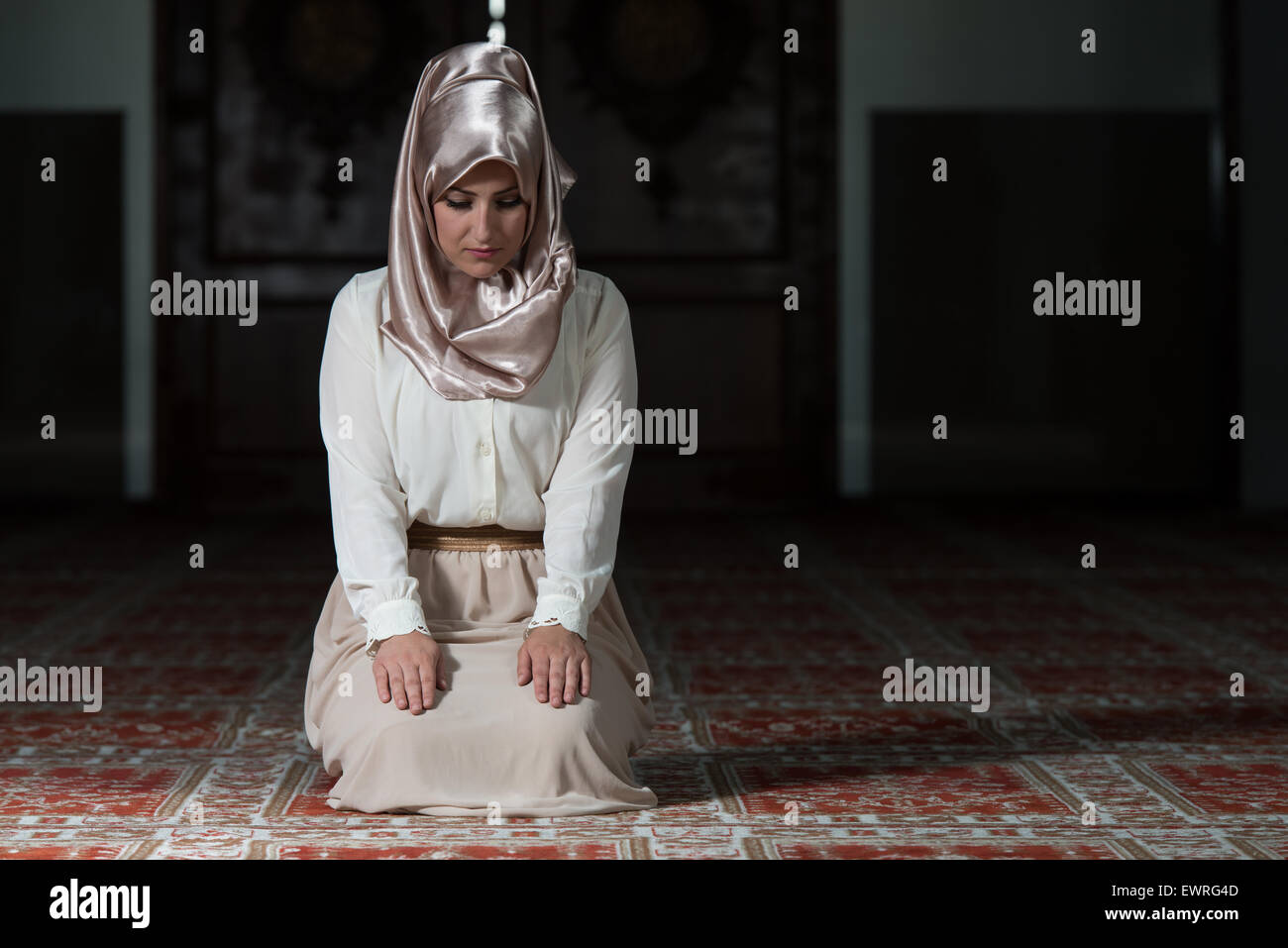 Young Muslim Woman Praying In Mosque Stock Photo - Alamy