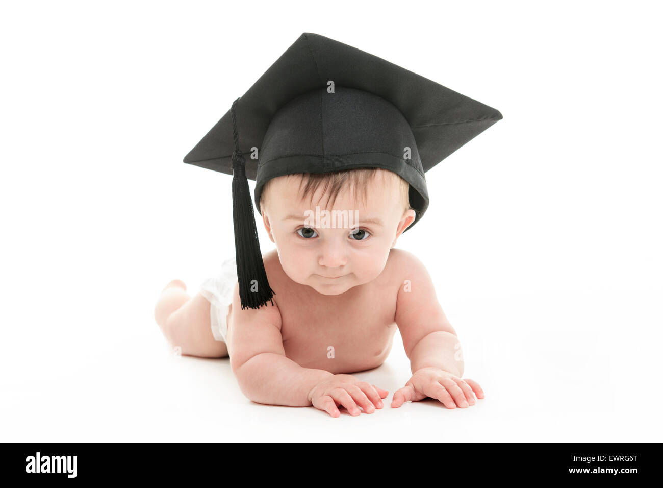 Portrait of a sitting baby with a graduation cap Stock Photo - Alamy
