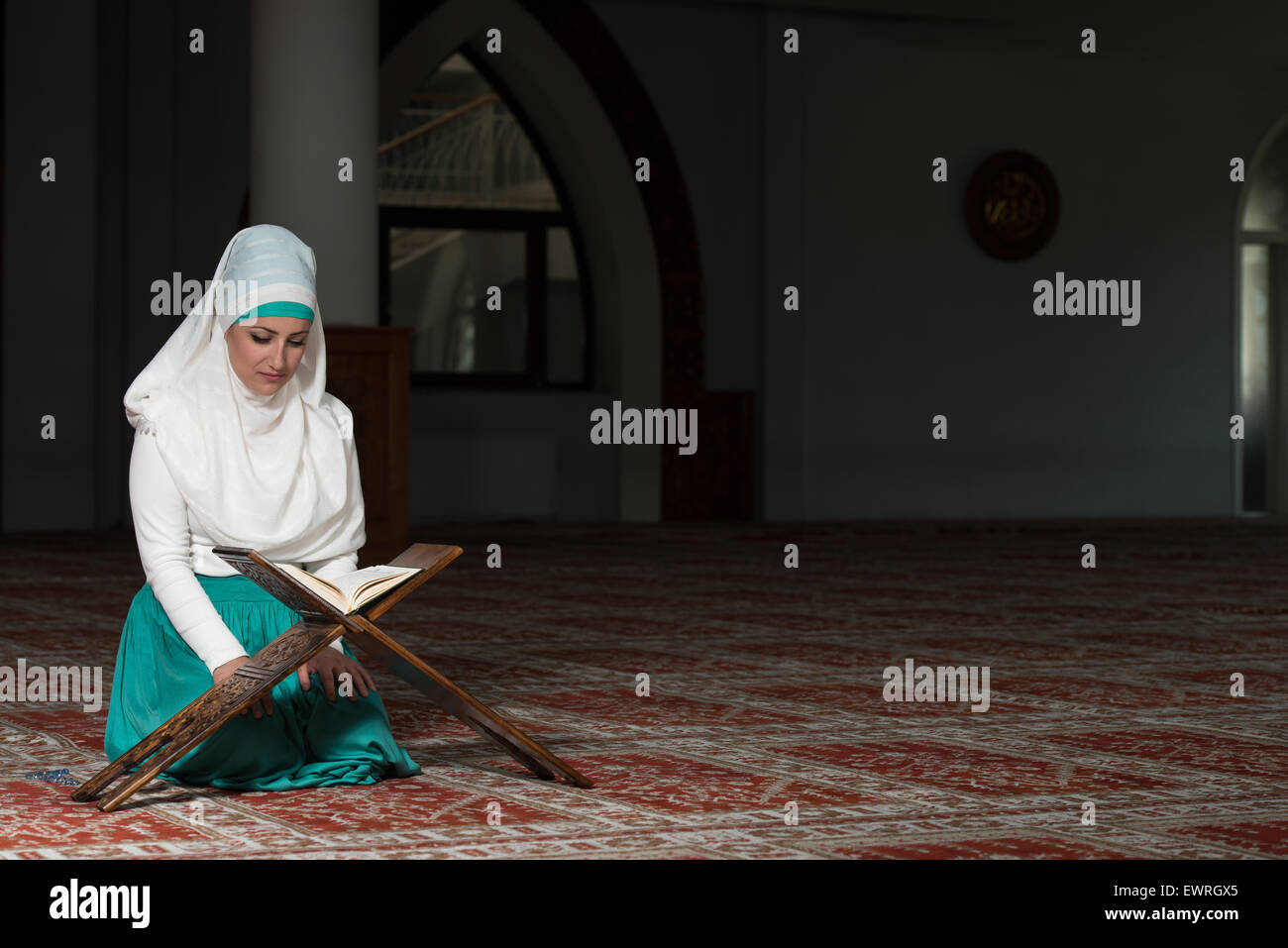 Muslim Woman Reading Holy Islamic Book Koran Stock Photo - Alamy