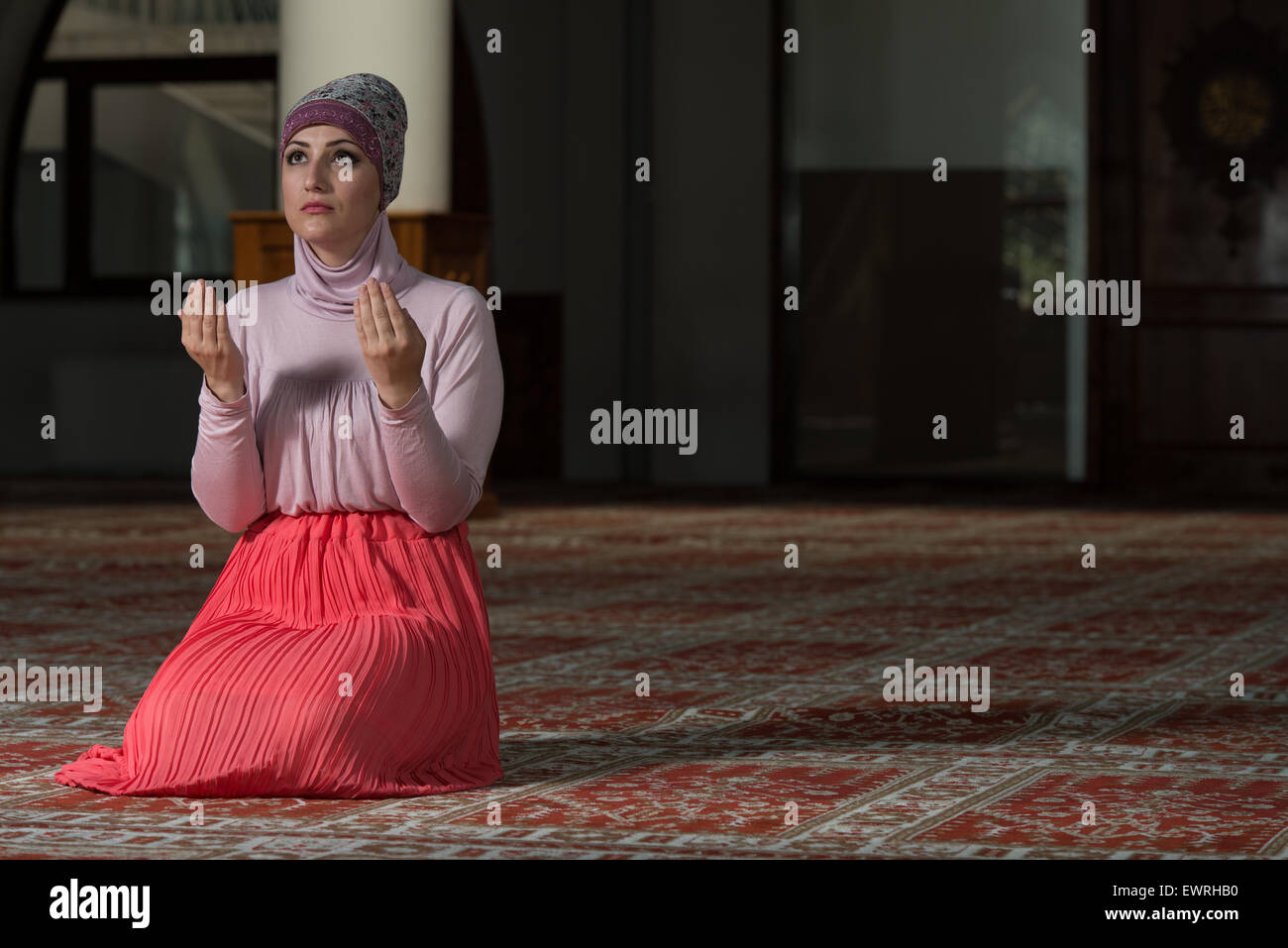 Young Muslim Woman Praying In Mosque Stock Photo - Alamy