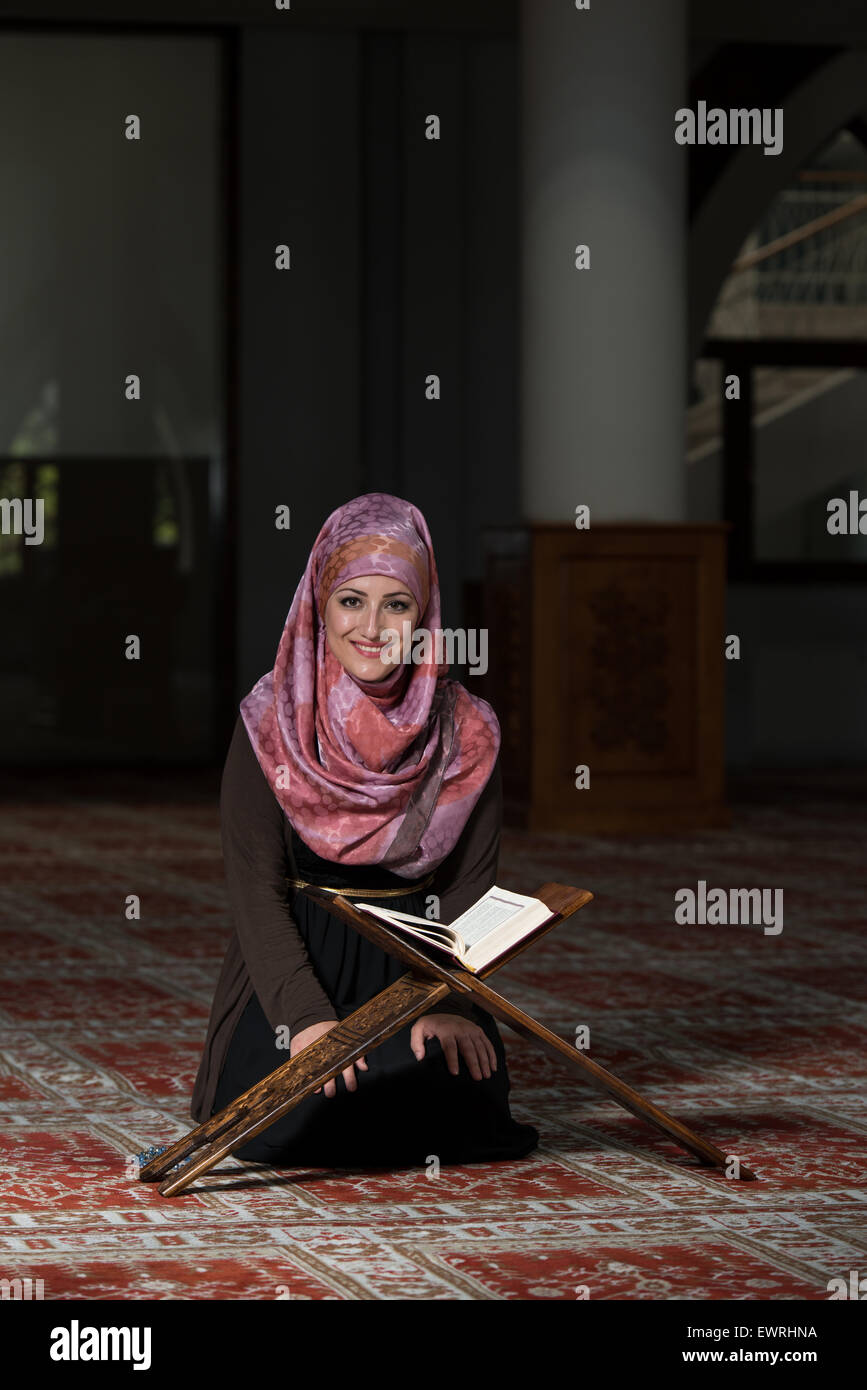 Muslim Woman Reading Holy Islamic Book Koran Stock Photo - Alamy