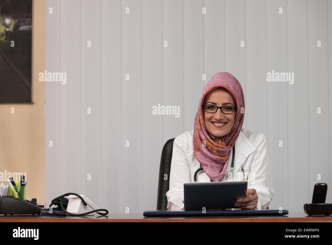 Muslim female doctor working on hi-res stock photography and images - Alamy