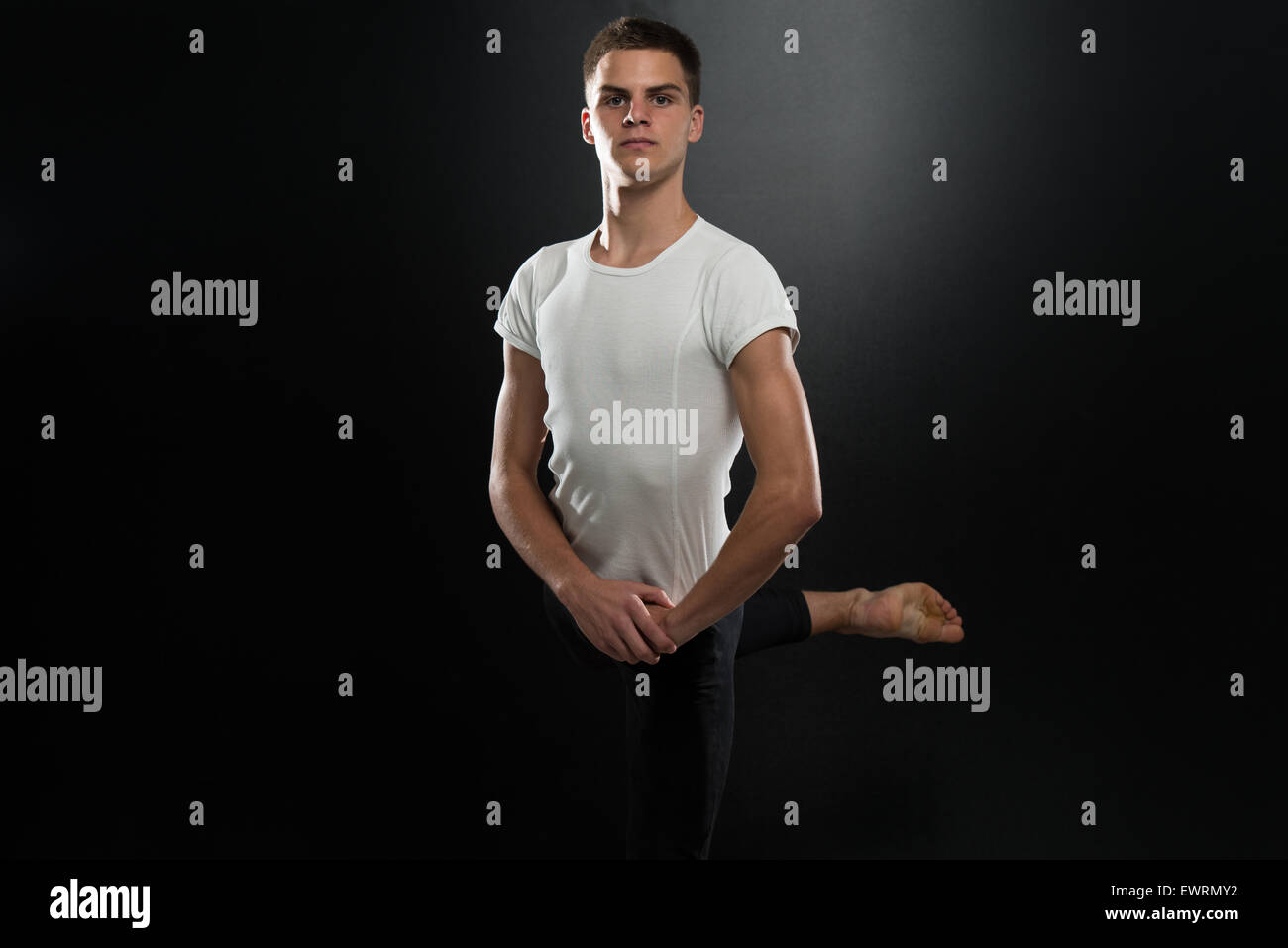 Handsome Male Ballet Dancer On A Black Background Stock Photo - Alamy