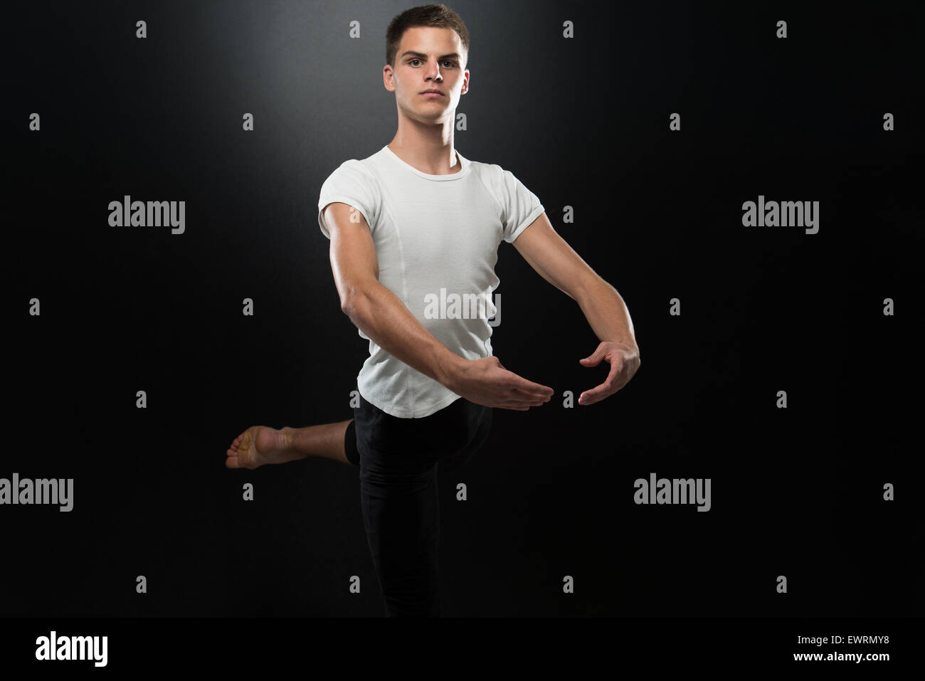 Handsome Male Ballet Dancer On A Black Background Stock Photo - Alamy