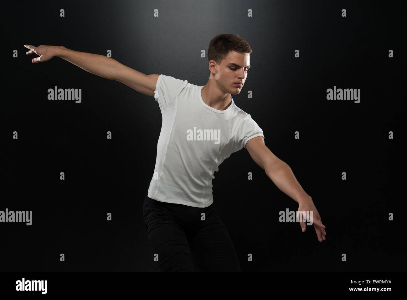 Handsome Male Ballet Dancer On A Black Background Stock Photo - Alamy