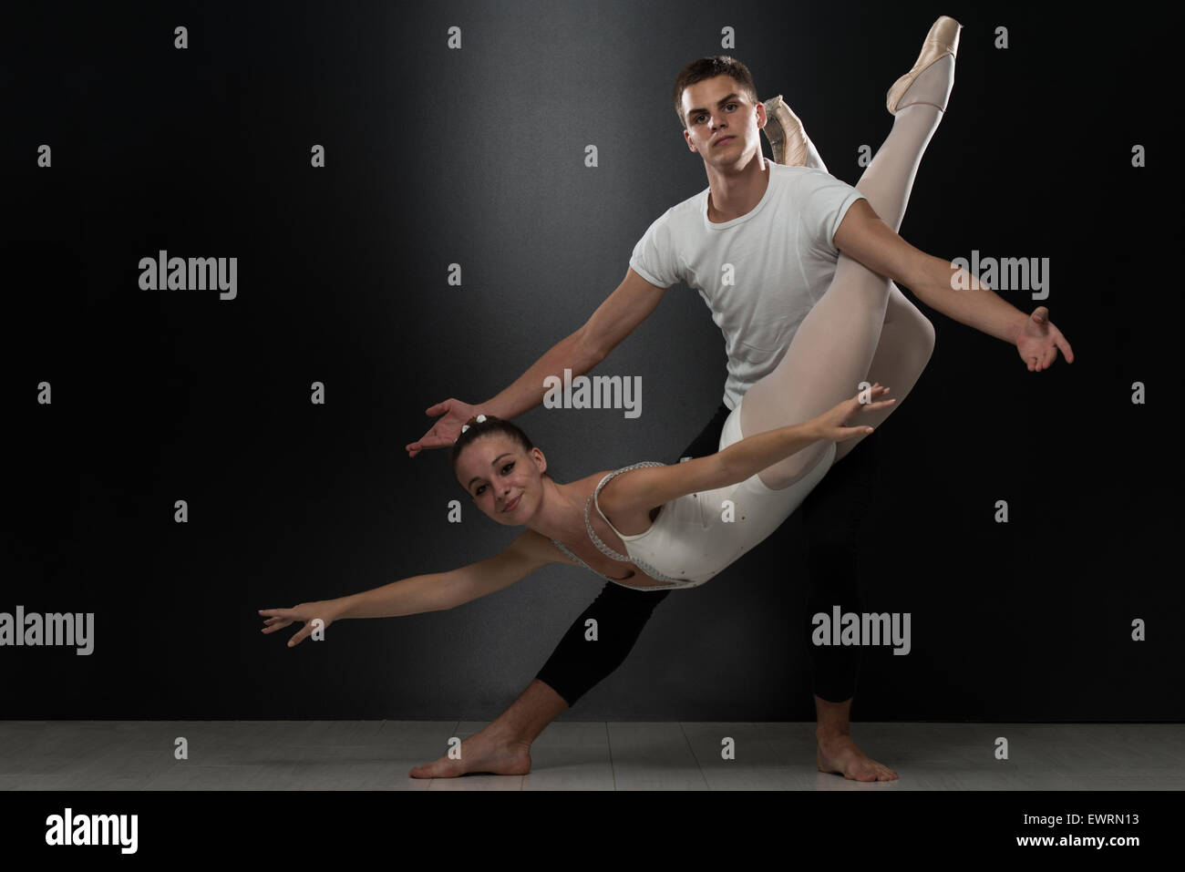 Handsome Couple Ballet Dancer On A Black Background Stock Photo - Alamy