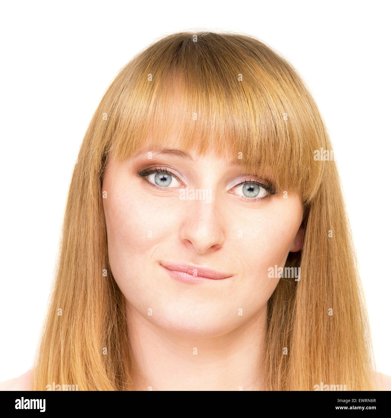 Young caucasian girl with doubtful dreamy mischievous expression on the ...