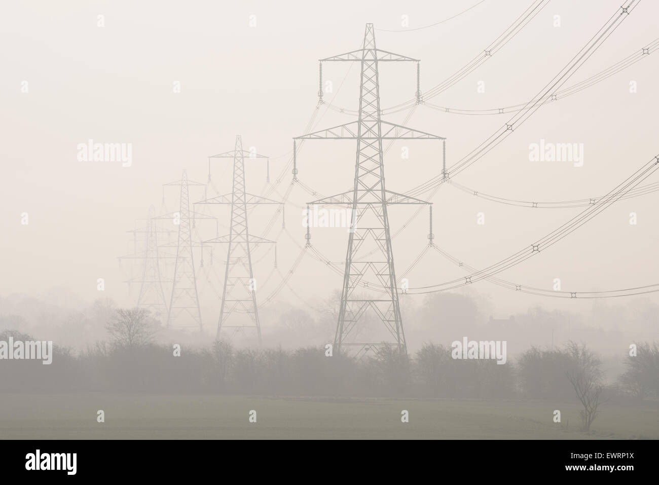 Pylons in mist near Ferrybridge, West Yorkshire Stock Photo - Alamy