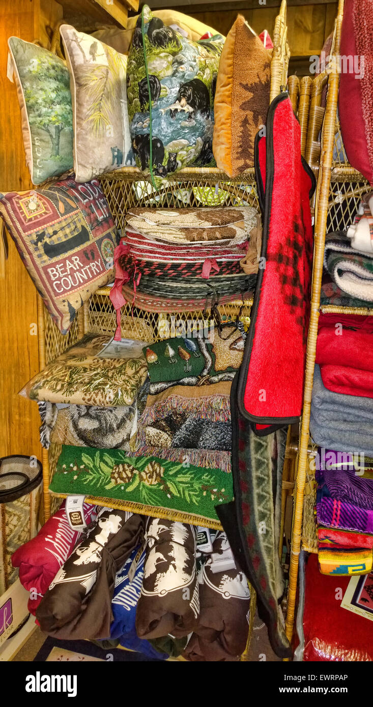 stuffed closet filled with rustic style blankets and pillows Stock ...