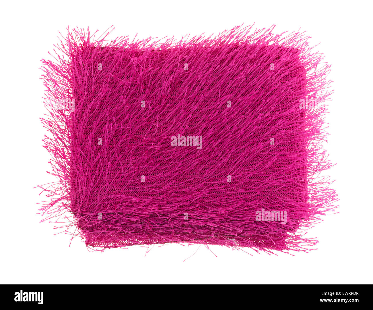 New roll of fuchsia fuzzy fashion trim fabric that has been opened on a ...