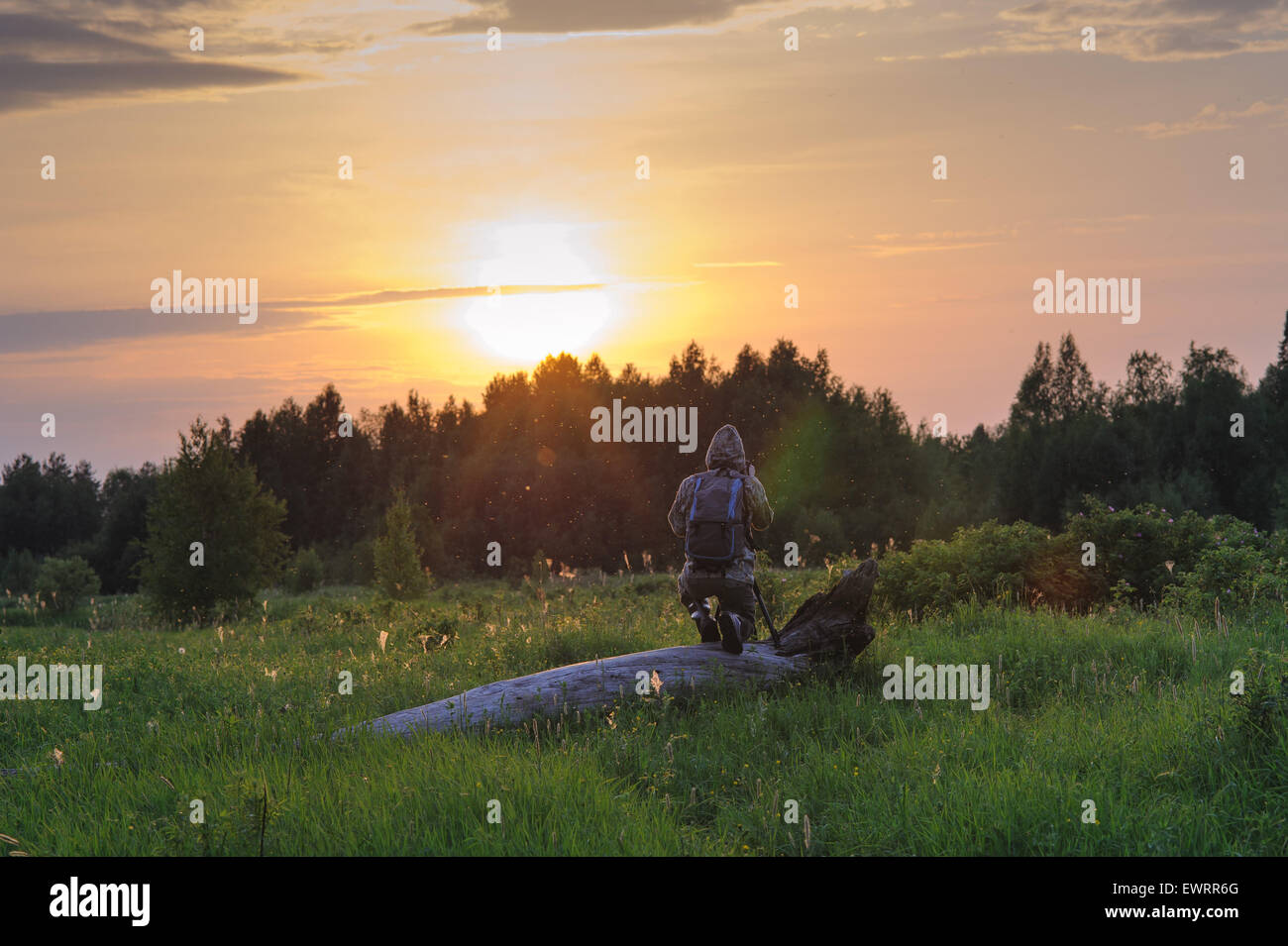 Professional photographer been photographing the landscape at sunset ...