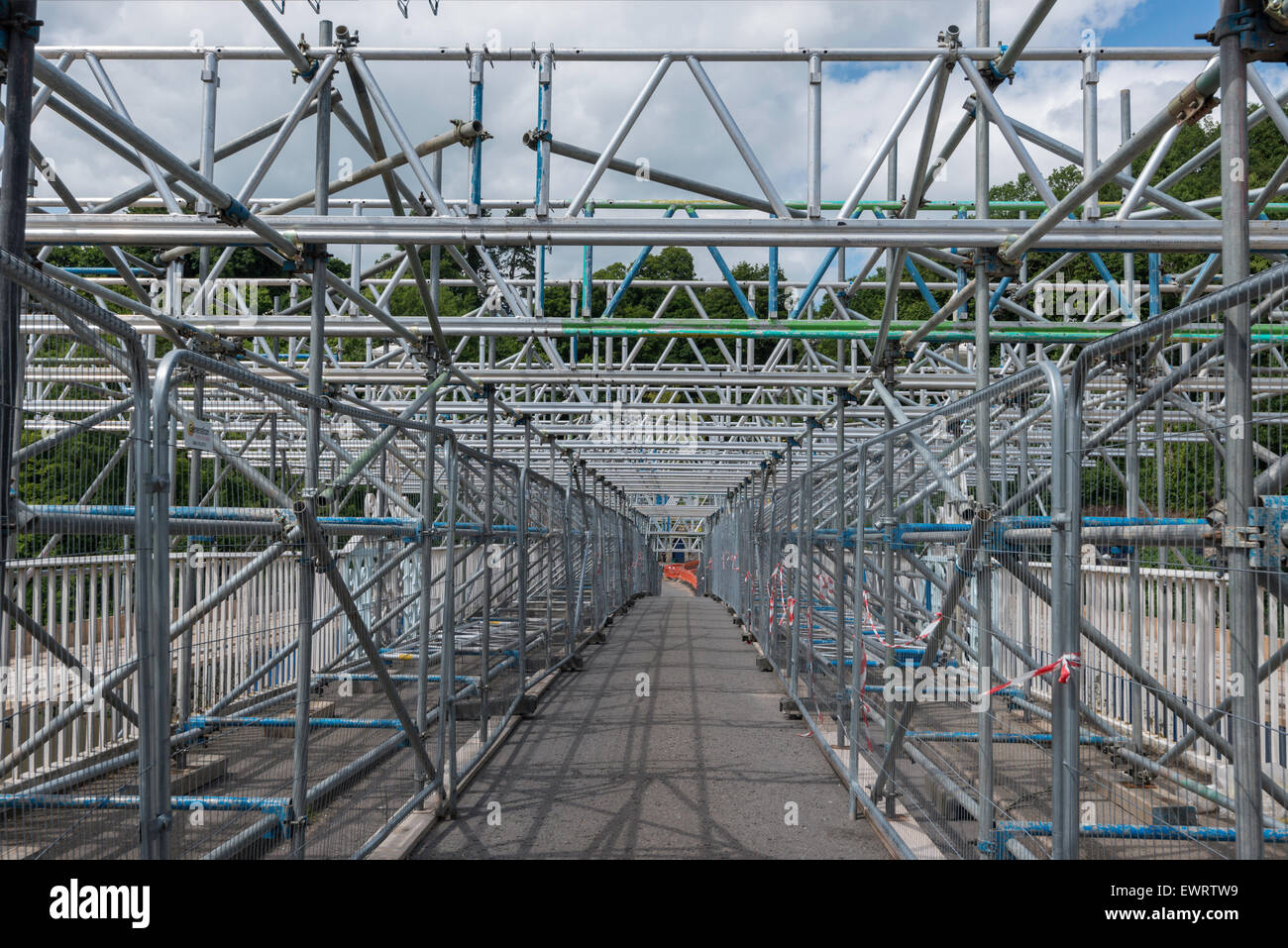 Scaffolding on Old Wye Bridge over River Wye for repair and maintenance ...