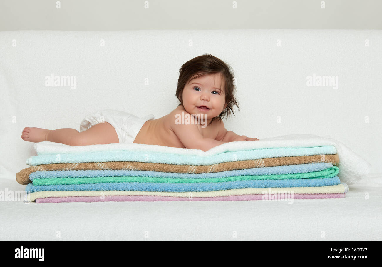 one happy baby on towel Stock Photo - Alamy