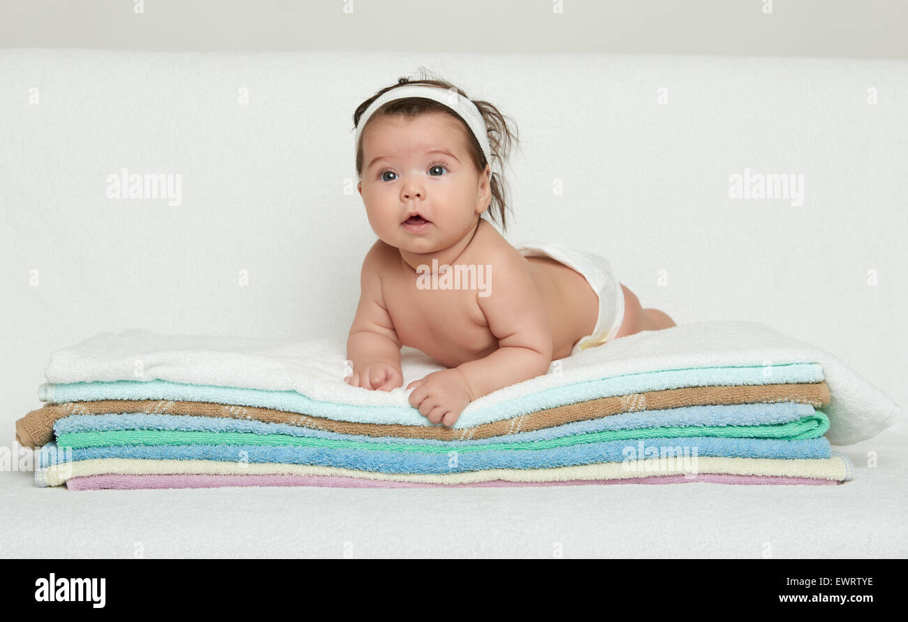 one happy baby on towel Stock Photo - Alamy