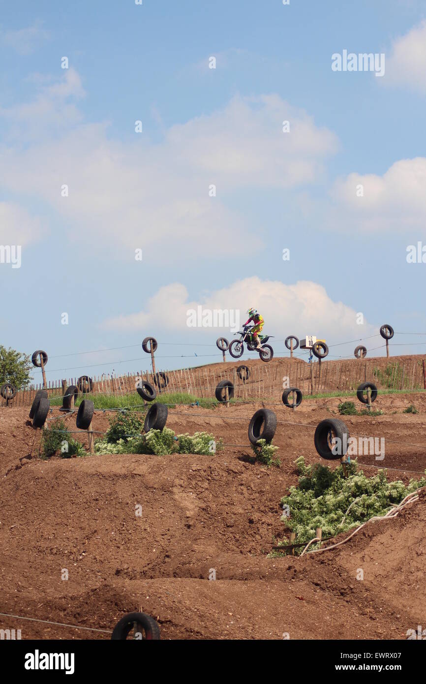 Action motorcycle, motocross, Speed and stunts leaping through the air ...