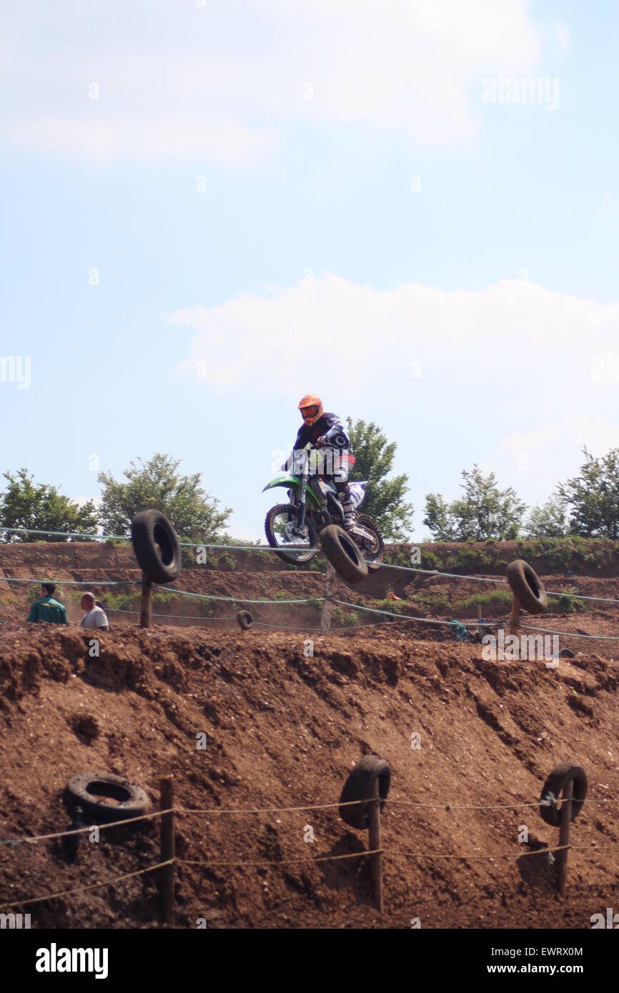 Action motorcycle, motocross, Speed and stunts leaping through the air ...