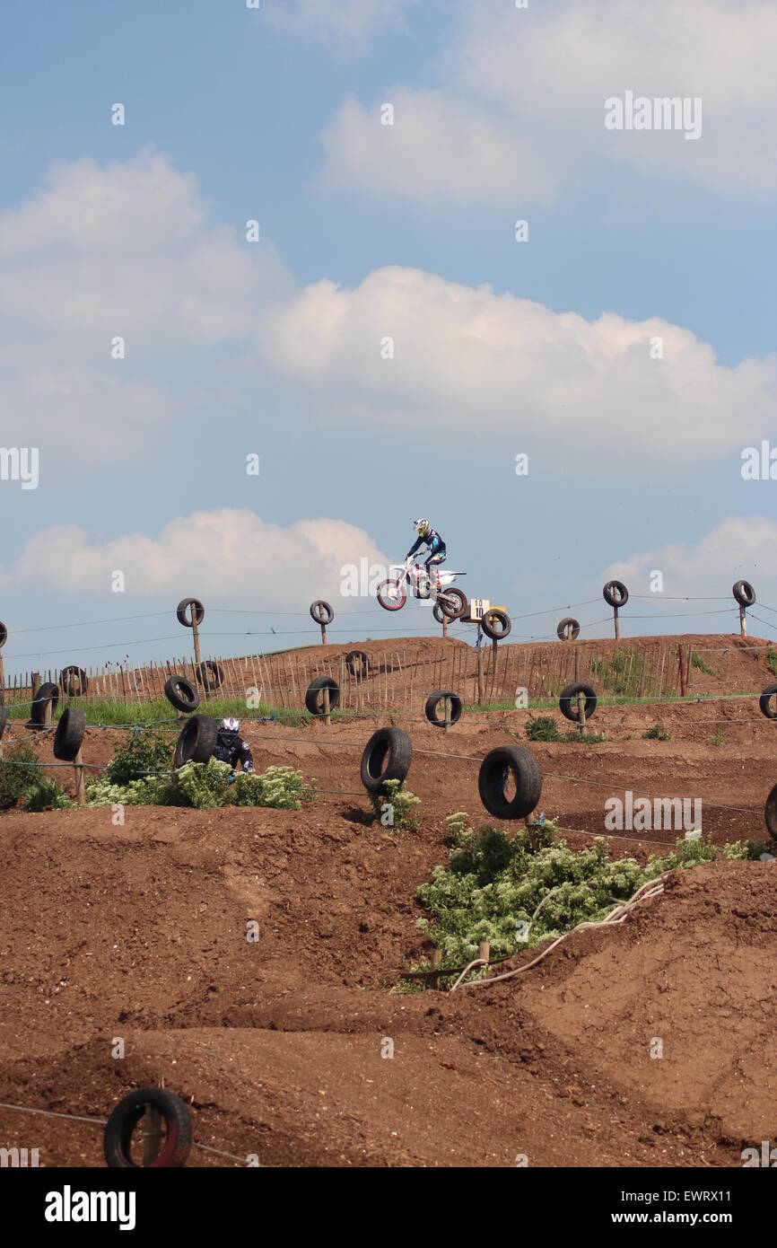 Action motorcycle, motocross, Speed and stunts leaping through the air ...