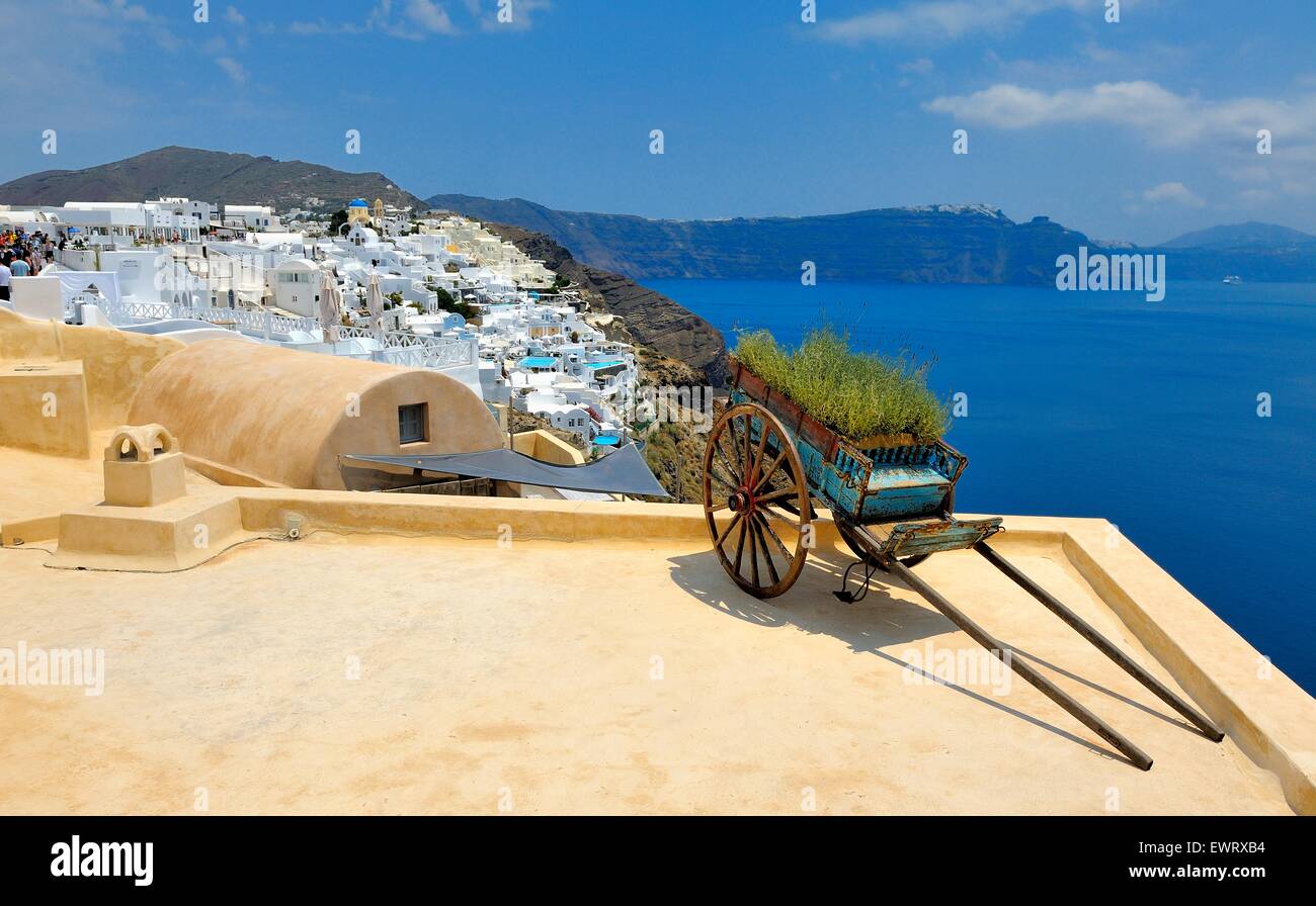 A lavender cart displayed on a rooftop in the village of Oia Santorini ...