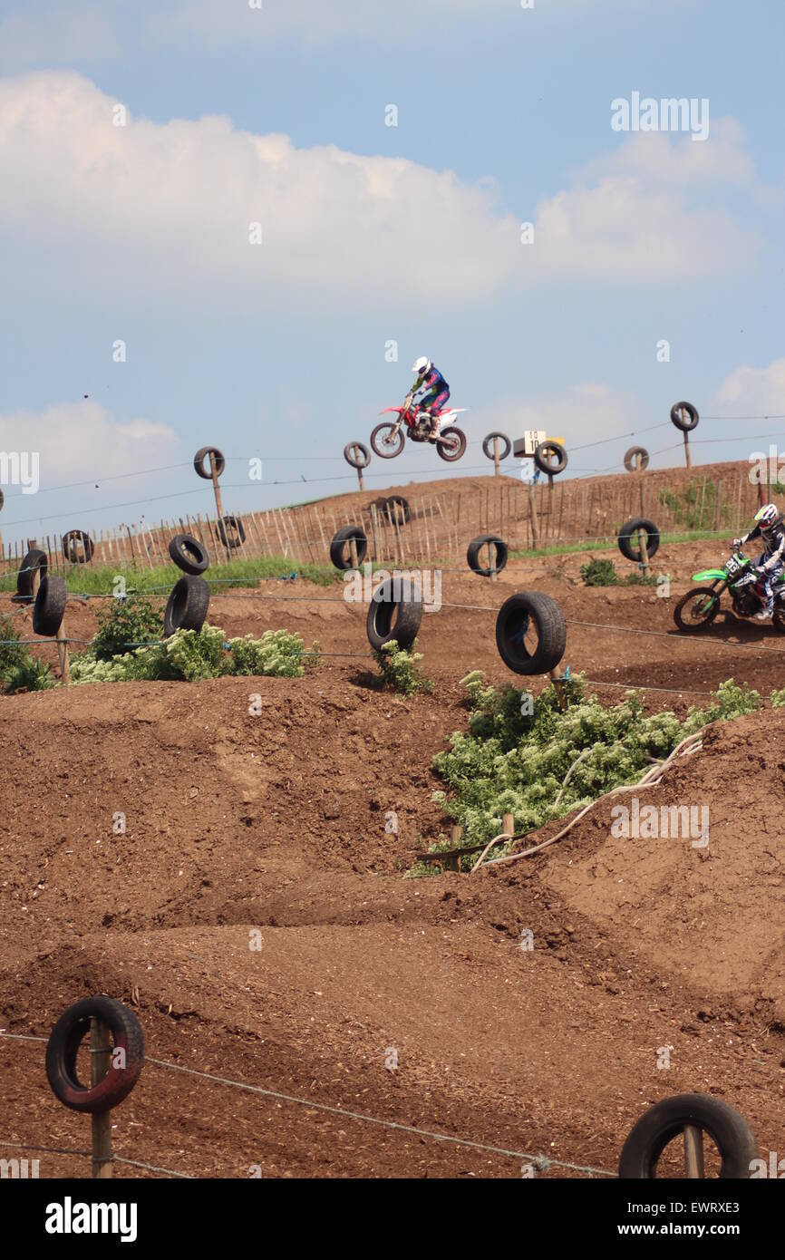 Action motorcycle, motocross, Speed and stunts leaping through the air ...