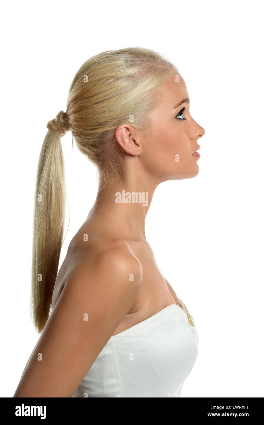 Profile portrait of beautiful teen girl isolated over white background ...
