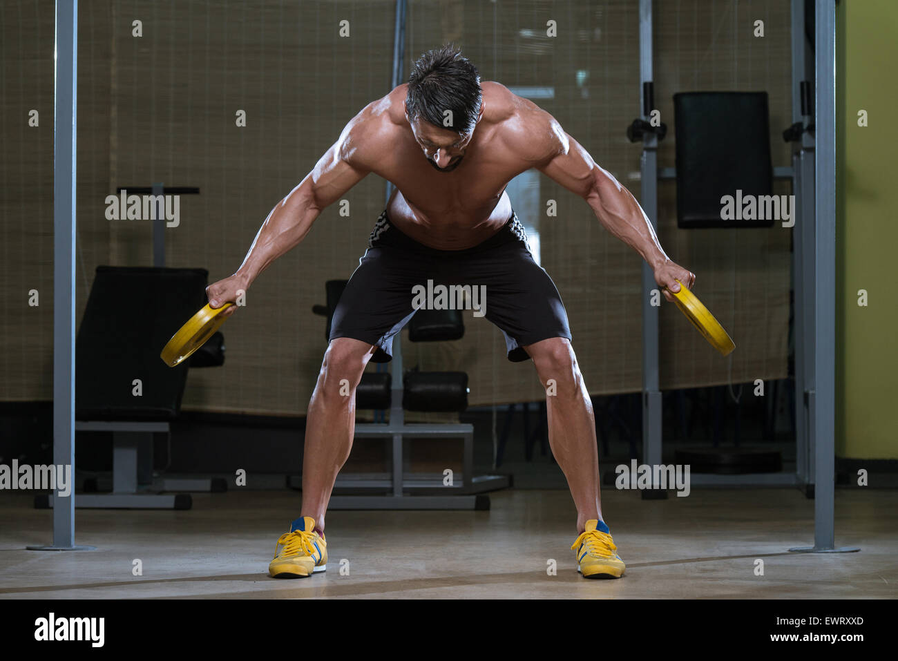 Male Fitness Athlete Doing Heavy Weight Exercise For Back Stock Photo ...