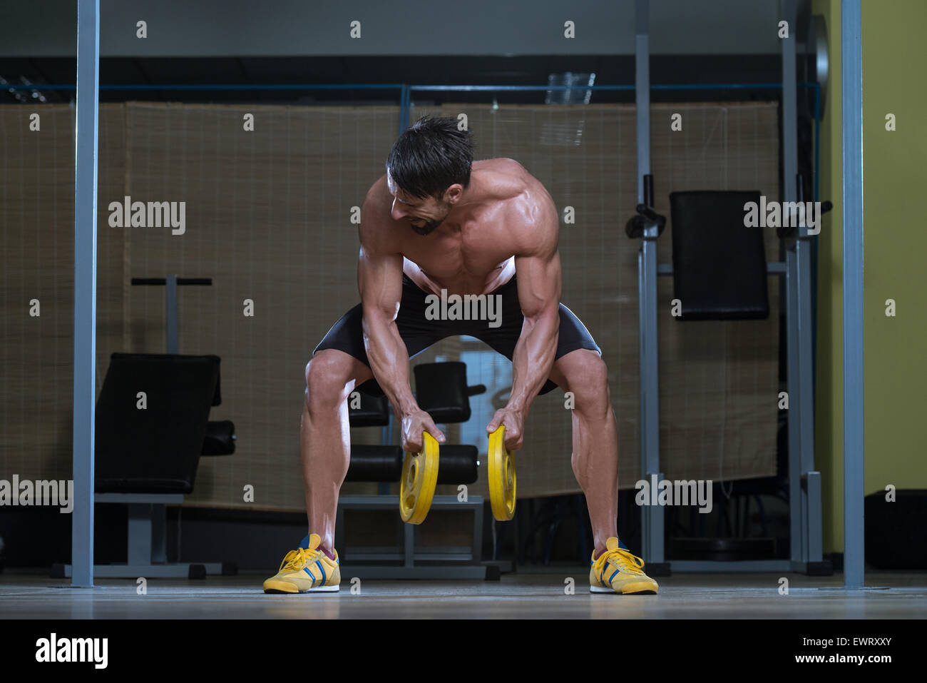 Male Fitness Athlete Doing Heavy Weight Exercise For Back Stock Photo ...