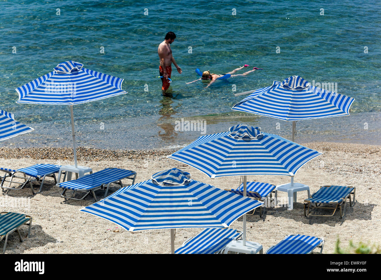 Greece beach sunbathing hi-res stock photography and images - Alamy