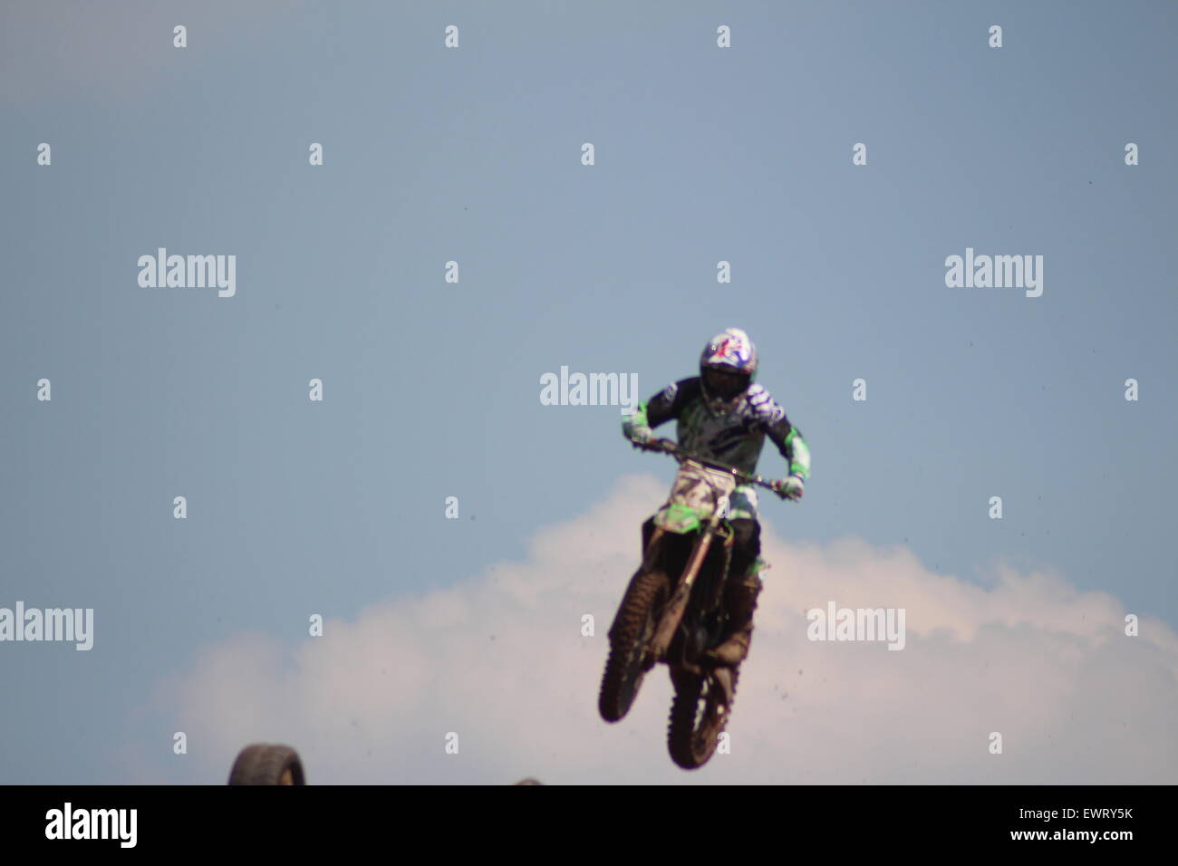 Action motorcycle, motocross, Speed and stunts leaping through the air ...