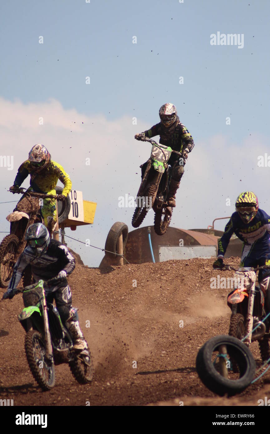 Action motorcycle, motocross, Speed and stunts leaping through the air ...