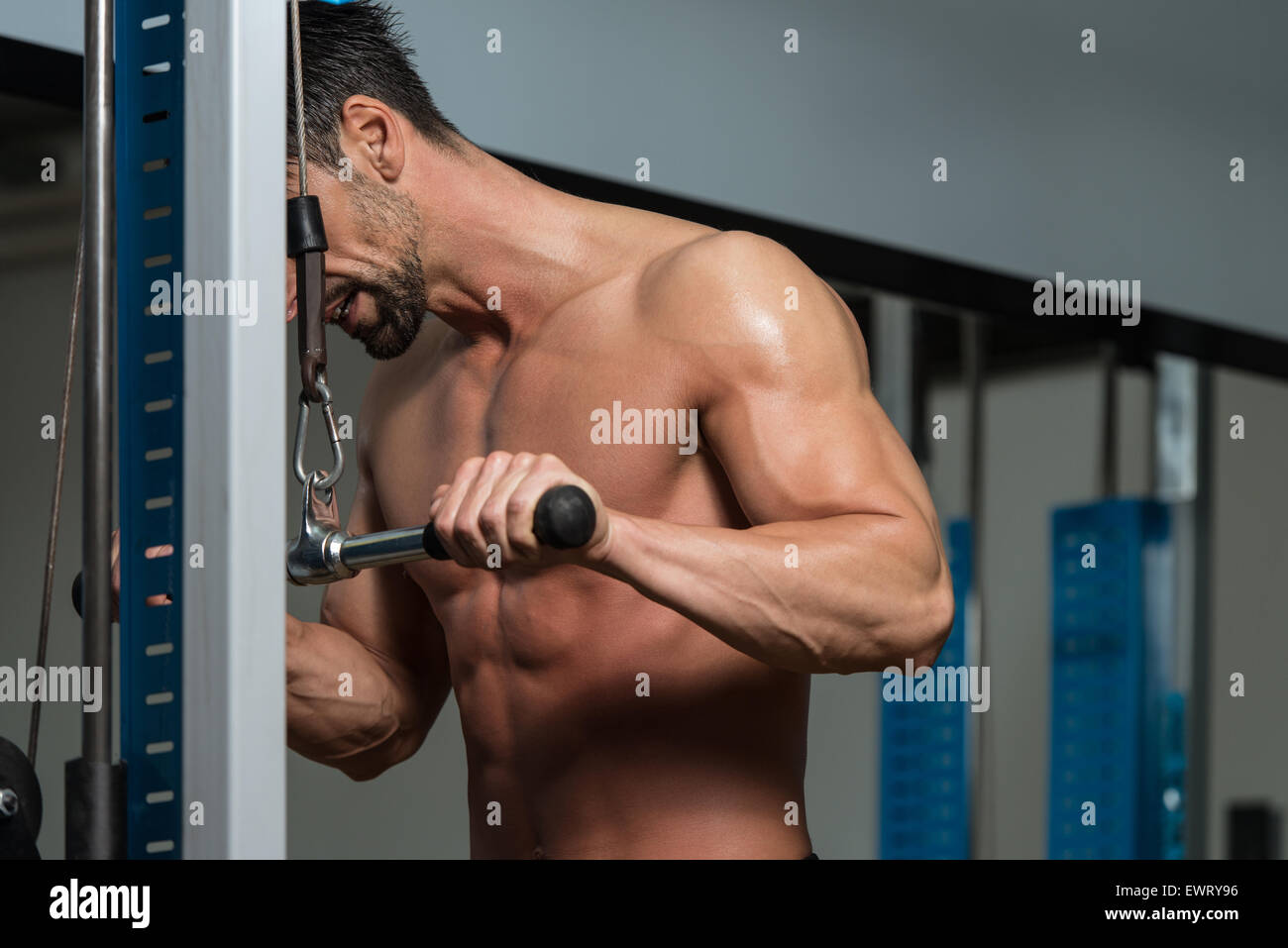 Strong young guy doing triceps hi-res stock photography and images - Alamy