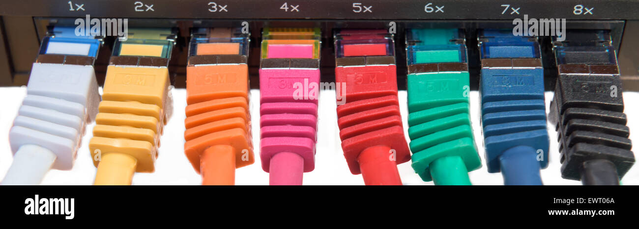 Colorful network cables connected to a switch Stock Photo - Alamy