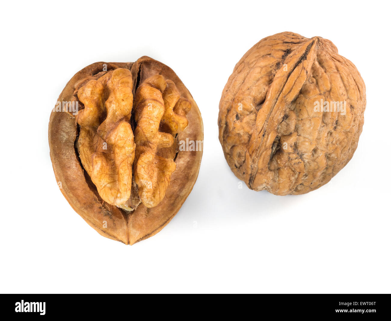 Opened and whole walnuts Stock Photo - Alamy
