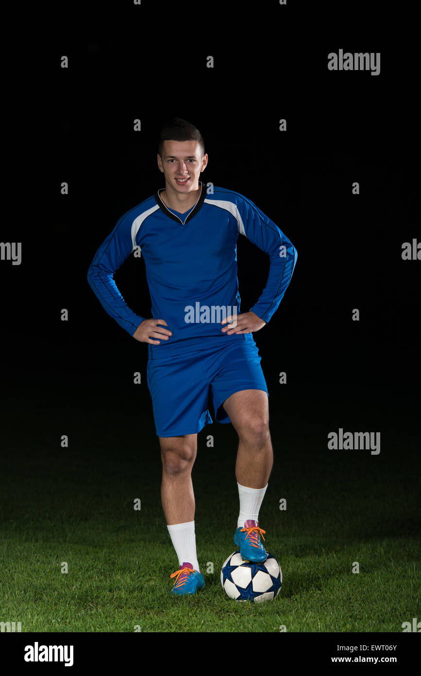 Portrait Of A Soccer Player And Ball On Football Stadium Field Isolated ...