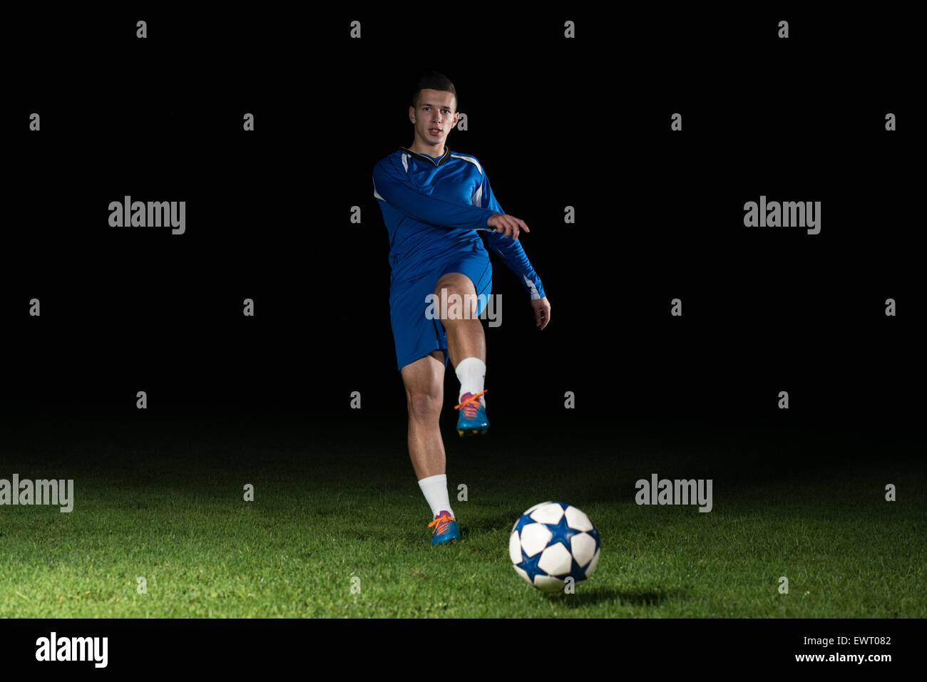 Soccer Player Doing Kick With Ball On Football Stadium Field Isolated ...
