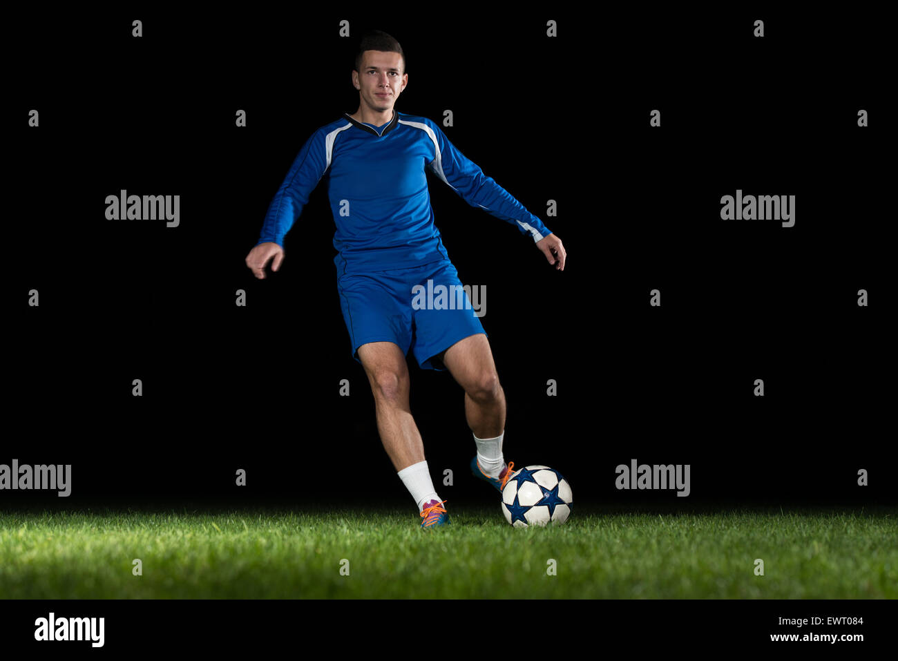 Soccer Player Doing Kick With Ball On Football Stadium Field Isolated ...