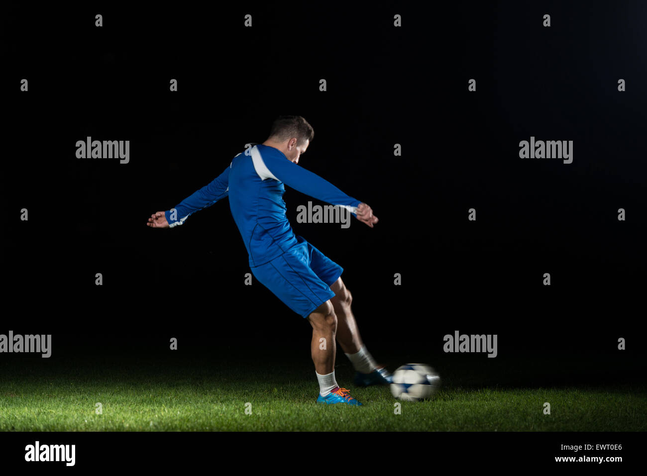 Soccer Player Doing Kick With Ball On Football Stadium Field Isolated ...