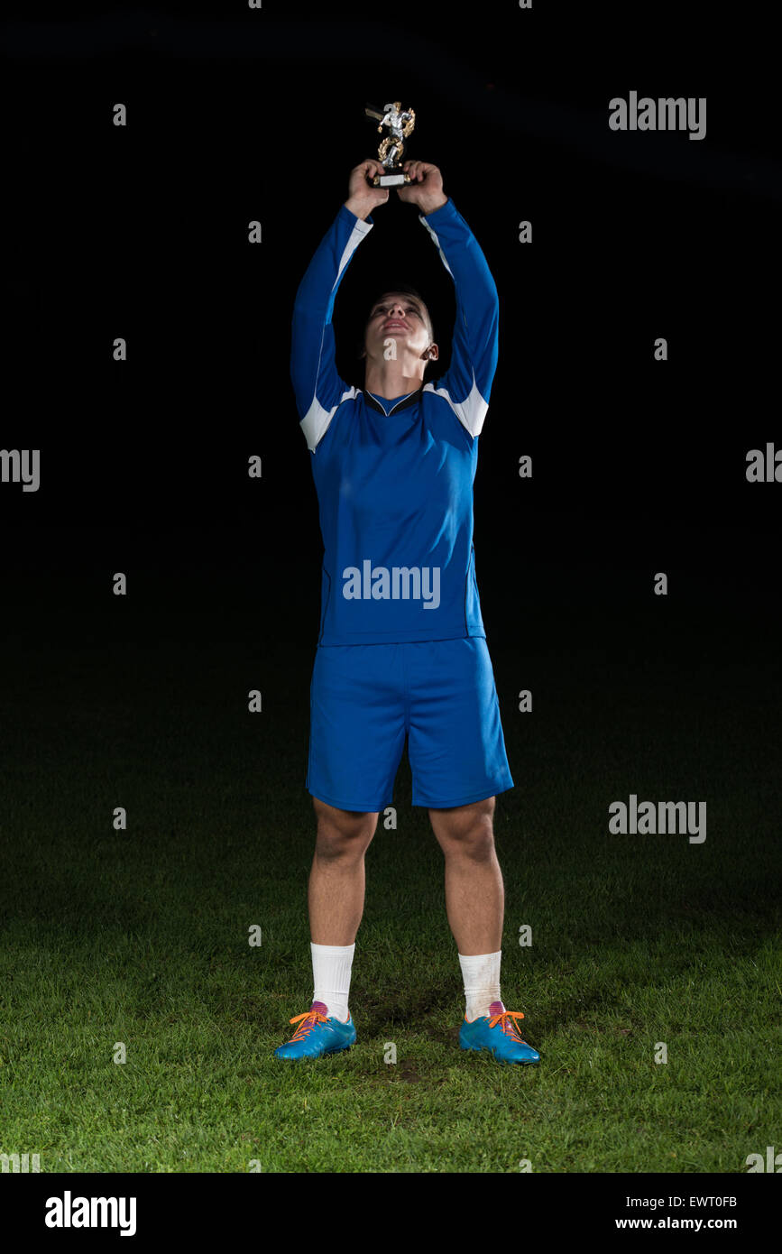 Soccer Player Celebrating The Victory And Become Champion Of Game While ...