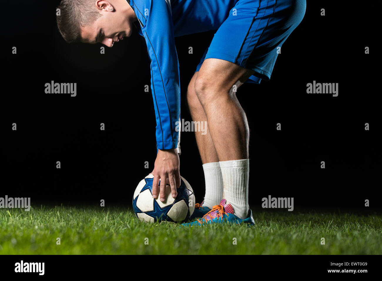 Soccer Player Positions The Ball Isolated On Black Background Stock ...