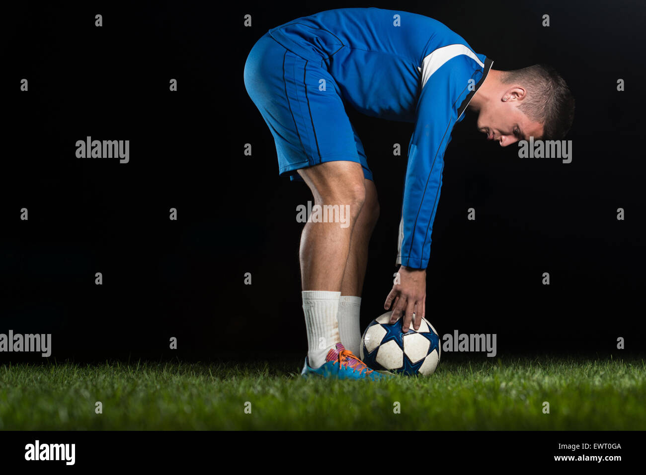 Soccer Player Positions The Ball Isolated On Black Background Stock ...