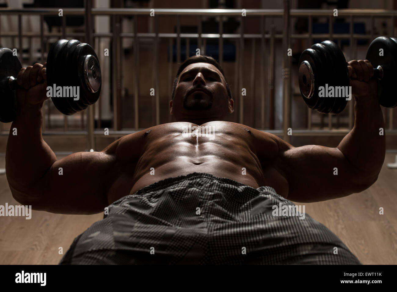 Mexican Bodybuilder Working Out Chest - Dumbbell Concentration Curls ...