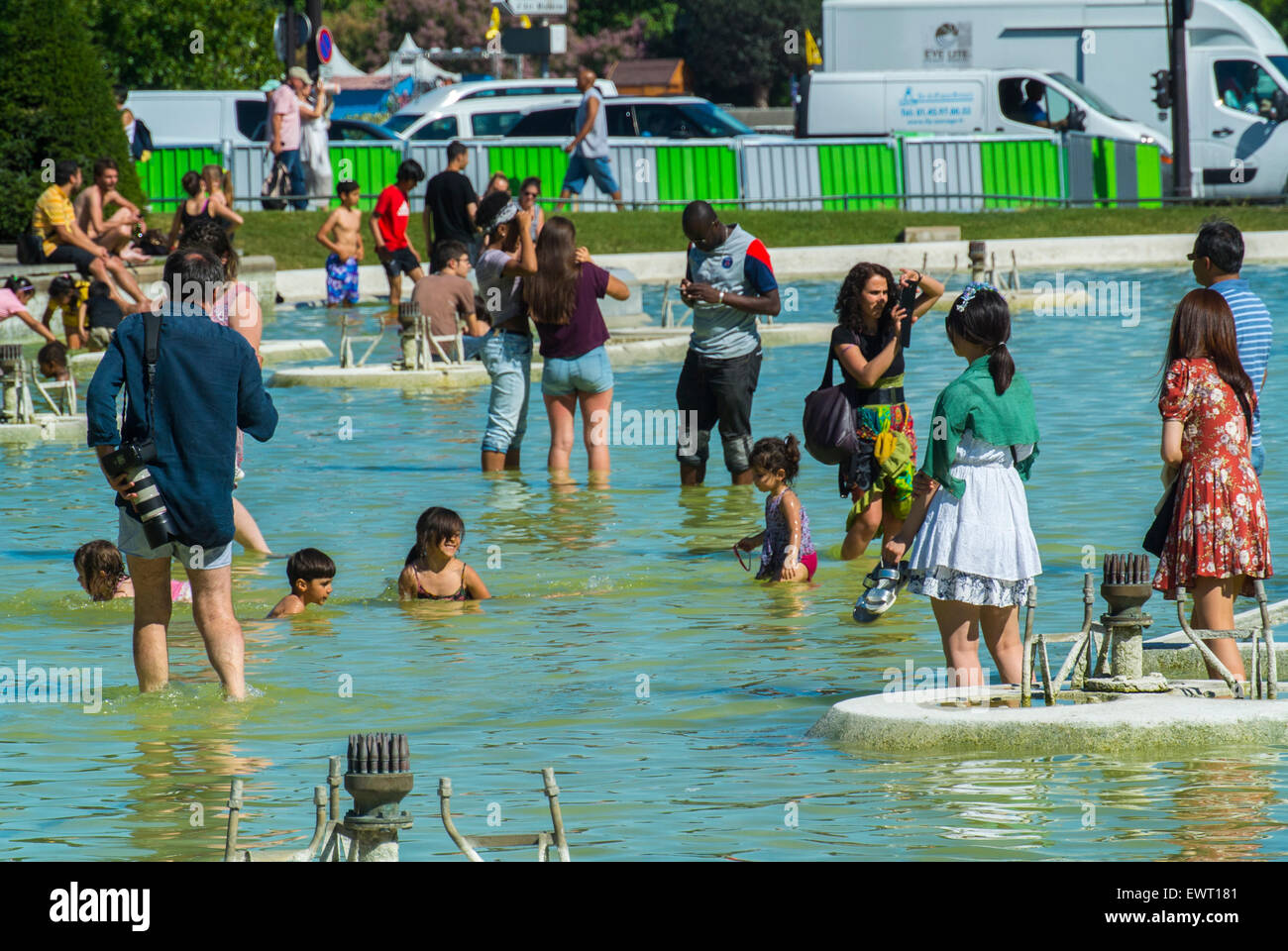 Paris, France. people urban public Enjoying Summer Urban Extreme Heat ...