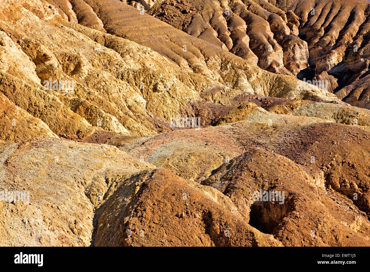 Face of Black Mountains with various colors of rock (different minerals ...