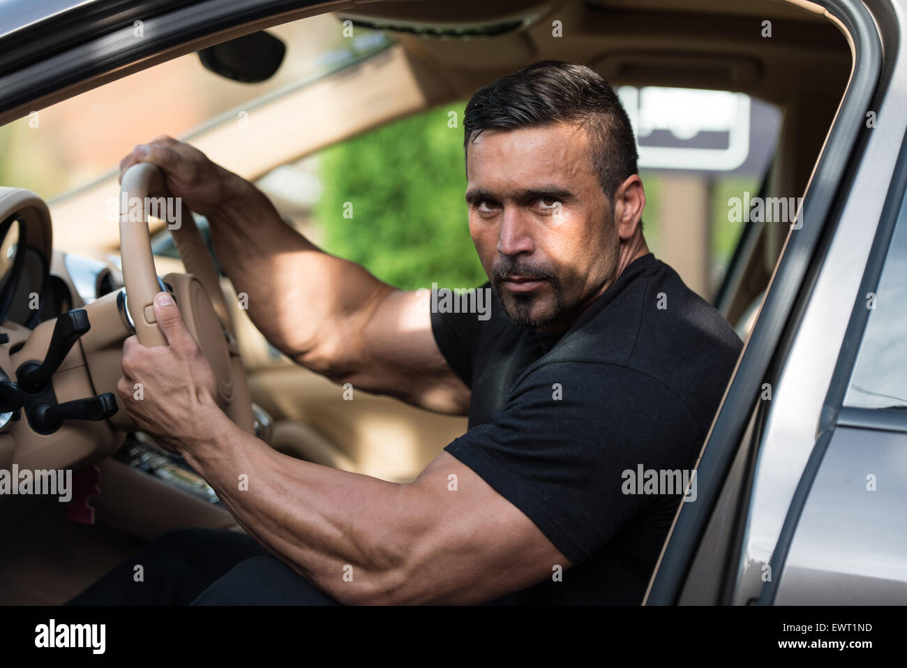 Indian man driving car hi-res stock photography and images - Alamy