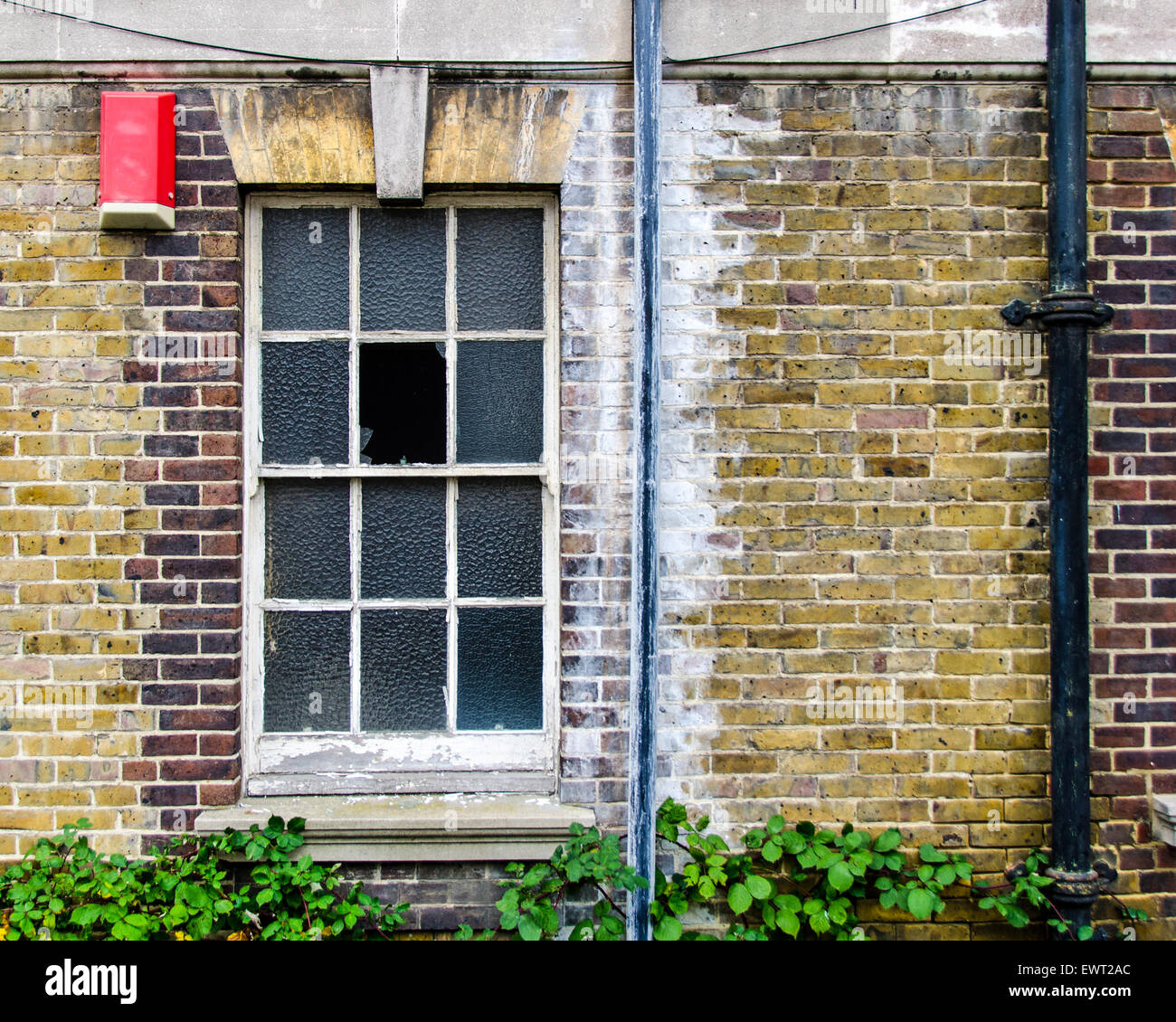 Derelict building in need of redevelopment. Showing broken window and ...