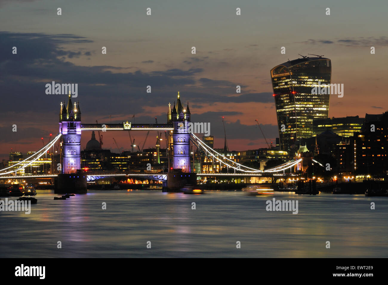 Tower Bridge and the Walkie Talkie Tower, London UK, illuminated at ...