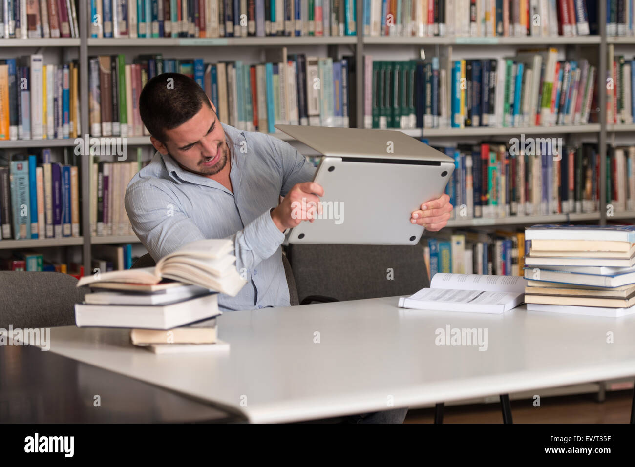 Male Student Throwing Laptop And Want To Destroy It - Shallow Depth Of ...