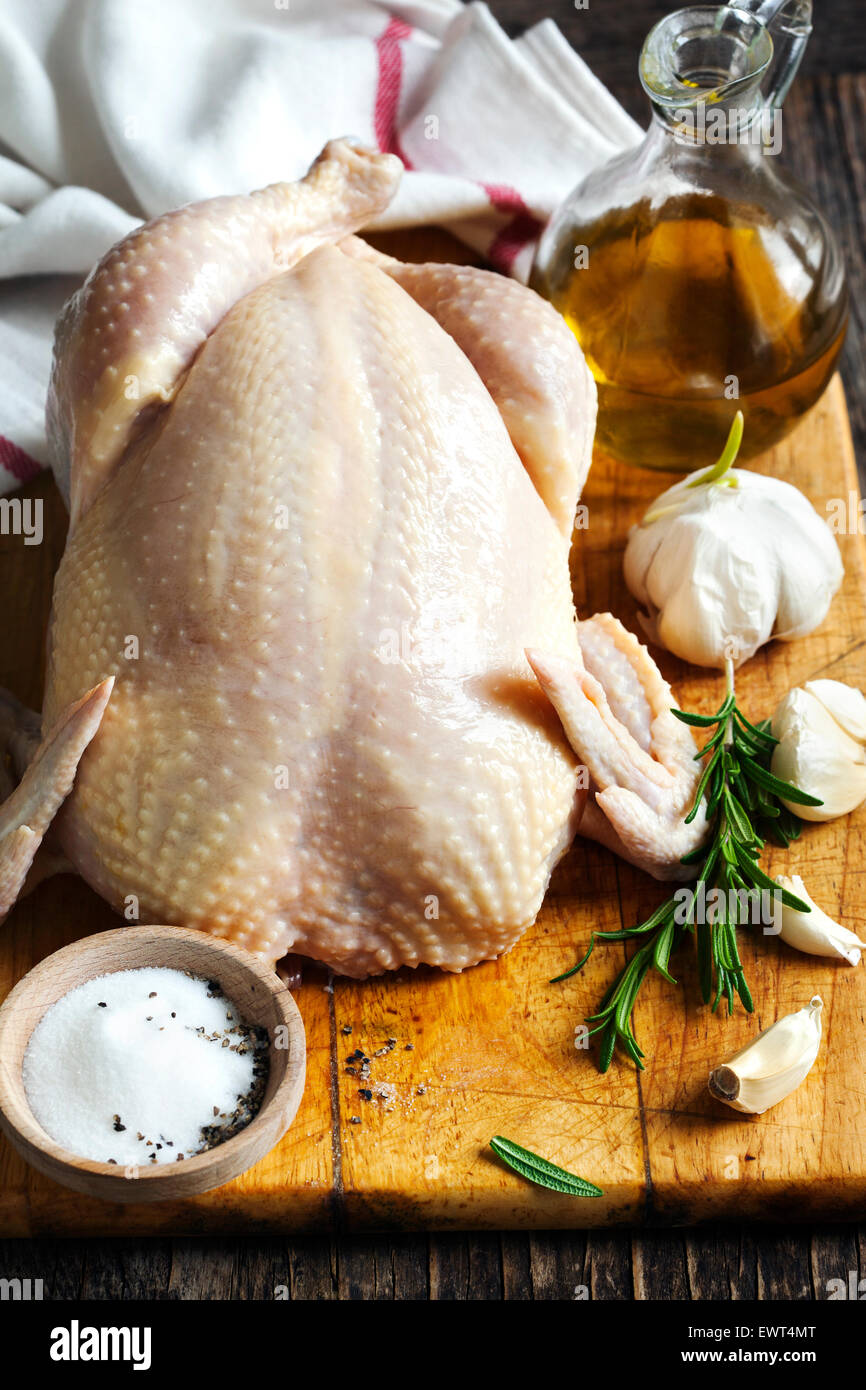 Raw chicken. Preparation for baking garlic chicken Stock Photo - Alamy